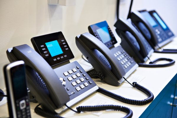 What does VoIP stand for and how does it work?
